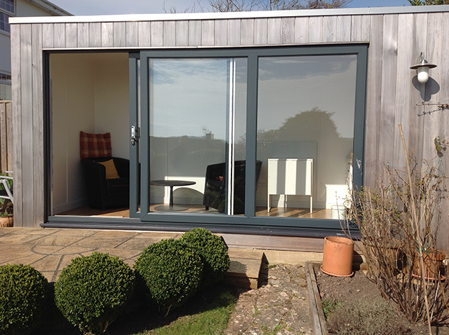 What does cedar cladding look like as it ages?